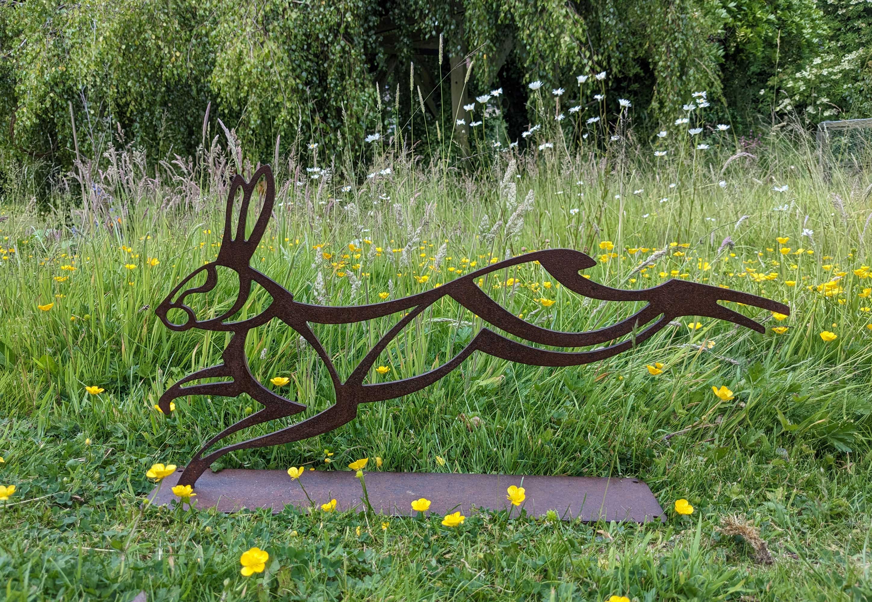 Running hare rusted steel sculpture – Janet Mary Robinson
